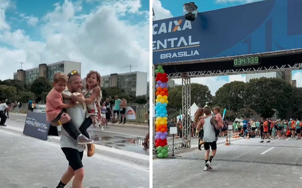 Pai cruza linha de chegada com os dois filhos no colo, em maratona do DF